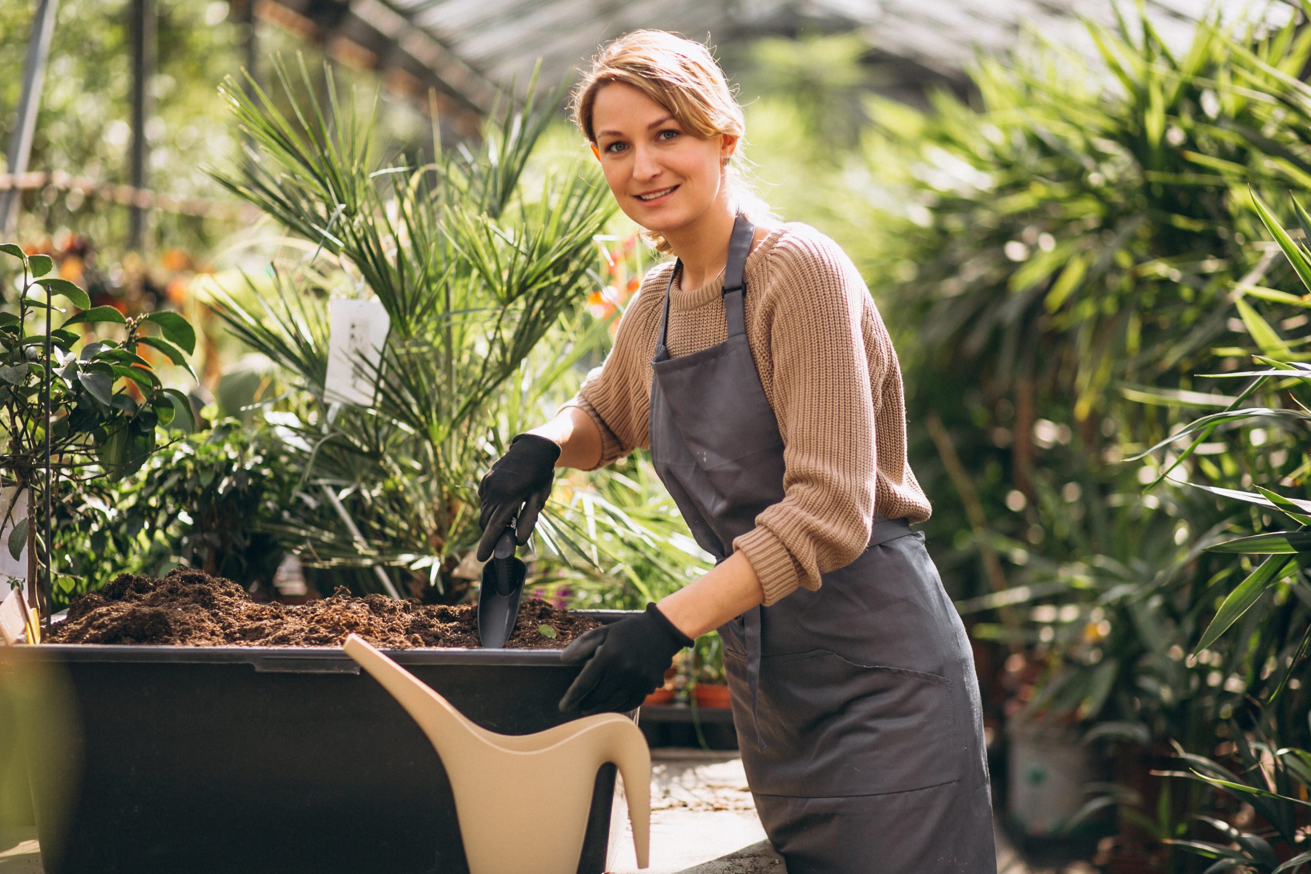 Woman gardner in a greenhouse – Cordova Safety